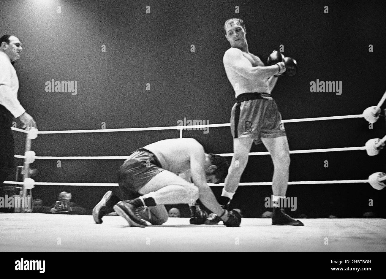 Jack Bodell towers over a fallen Billy Walker after knocking him down ...