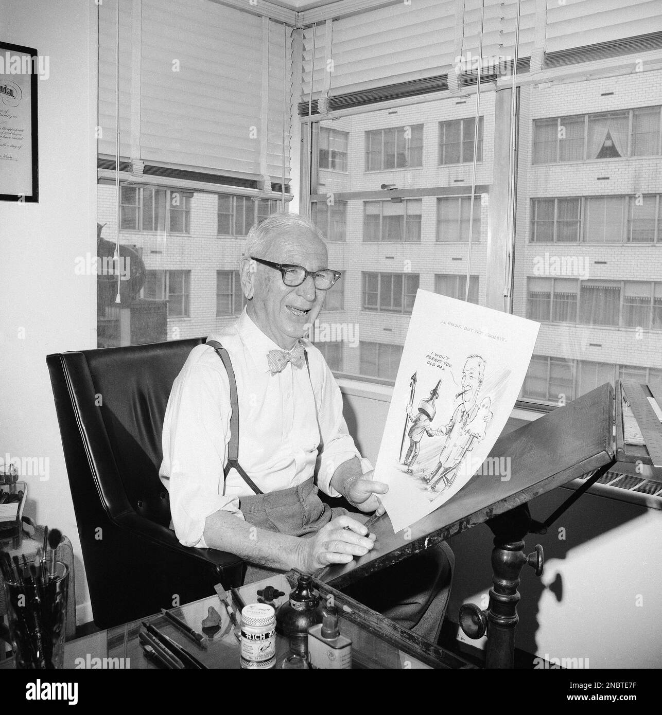 Cartoonist Rube Goldberg, 81, is shown in his New York City apartment ...