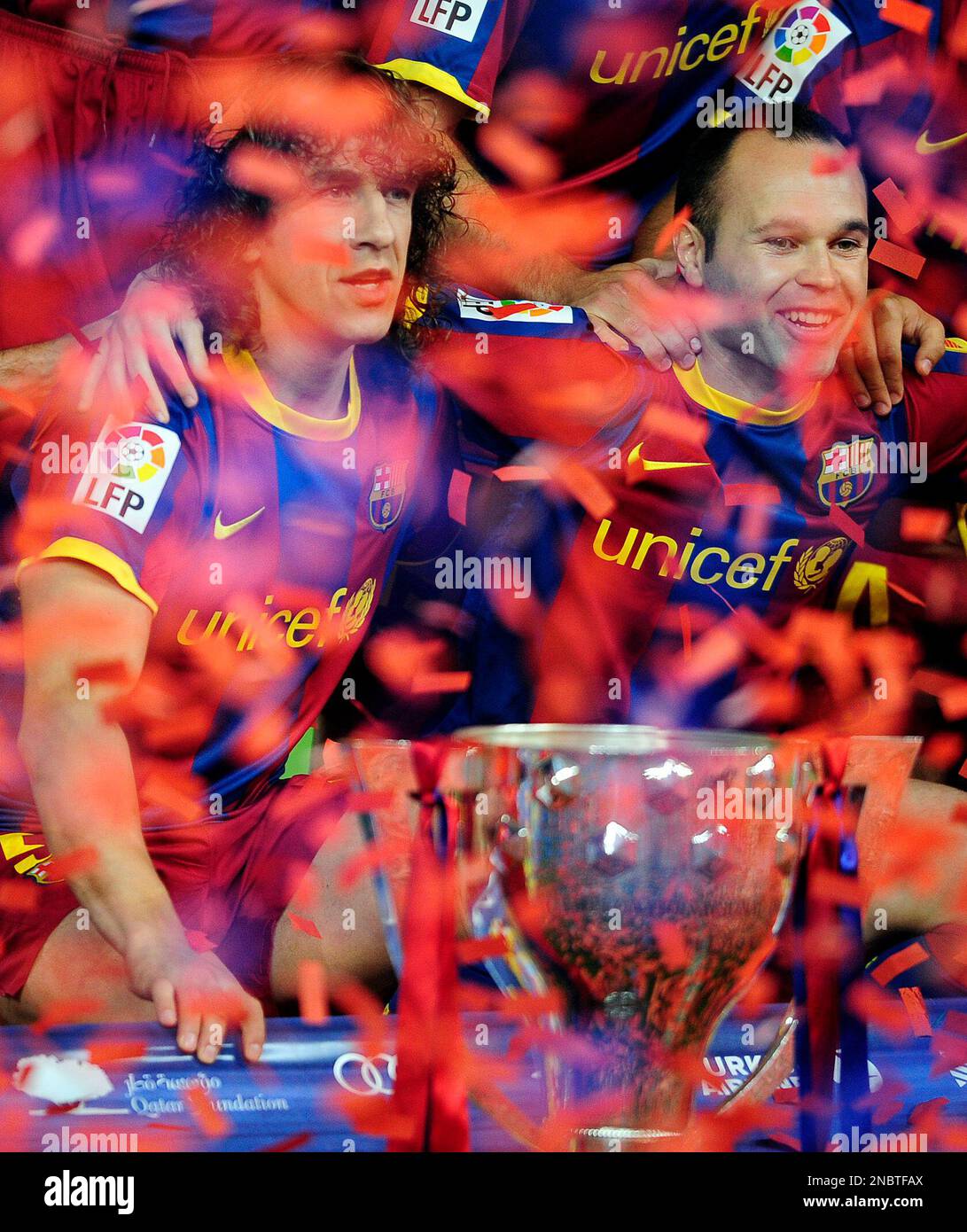 FC Barcelona's Carles Puyol, left, and Andres Iniesta celebrate with ...