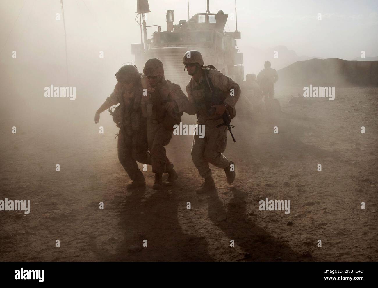 US Army flight medic SGT Jaime Adame, left, and an unidentified United ...
