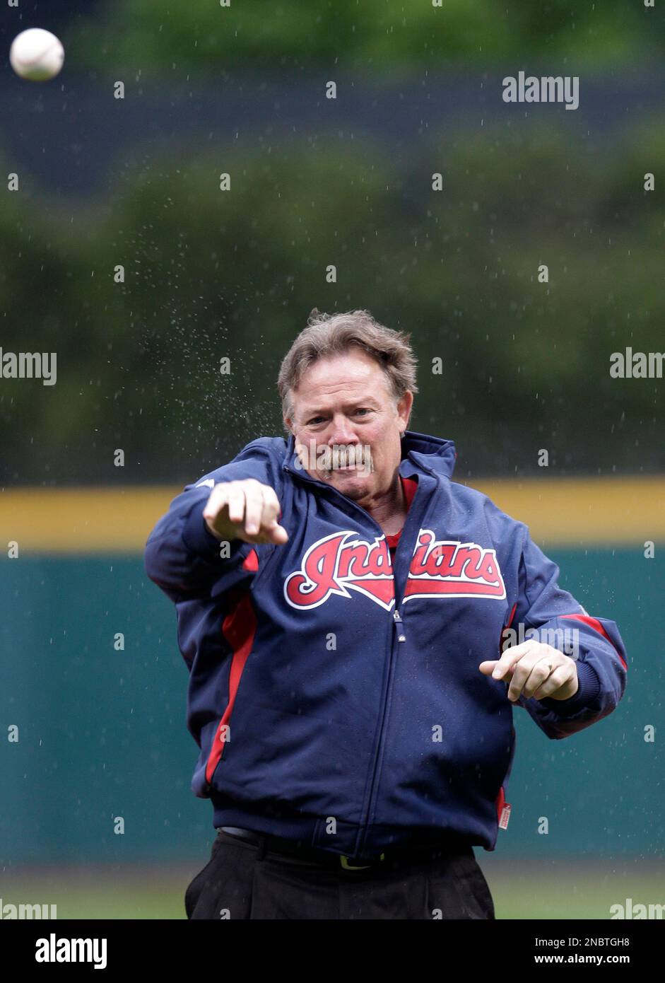 Former Cleveland Indians player Len Barker throws out the ceremonial ...