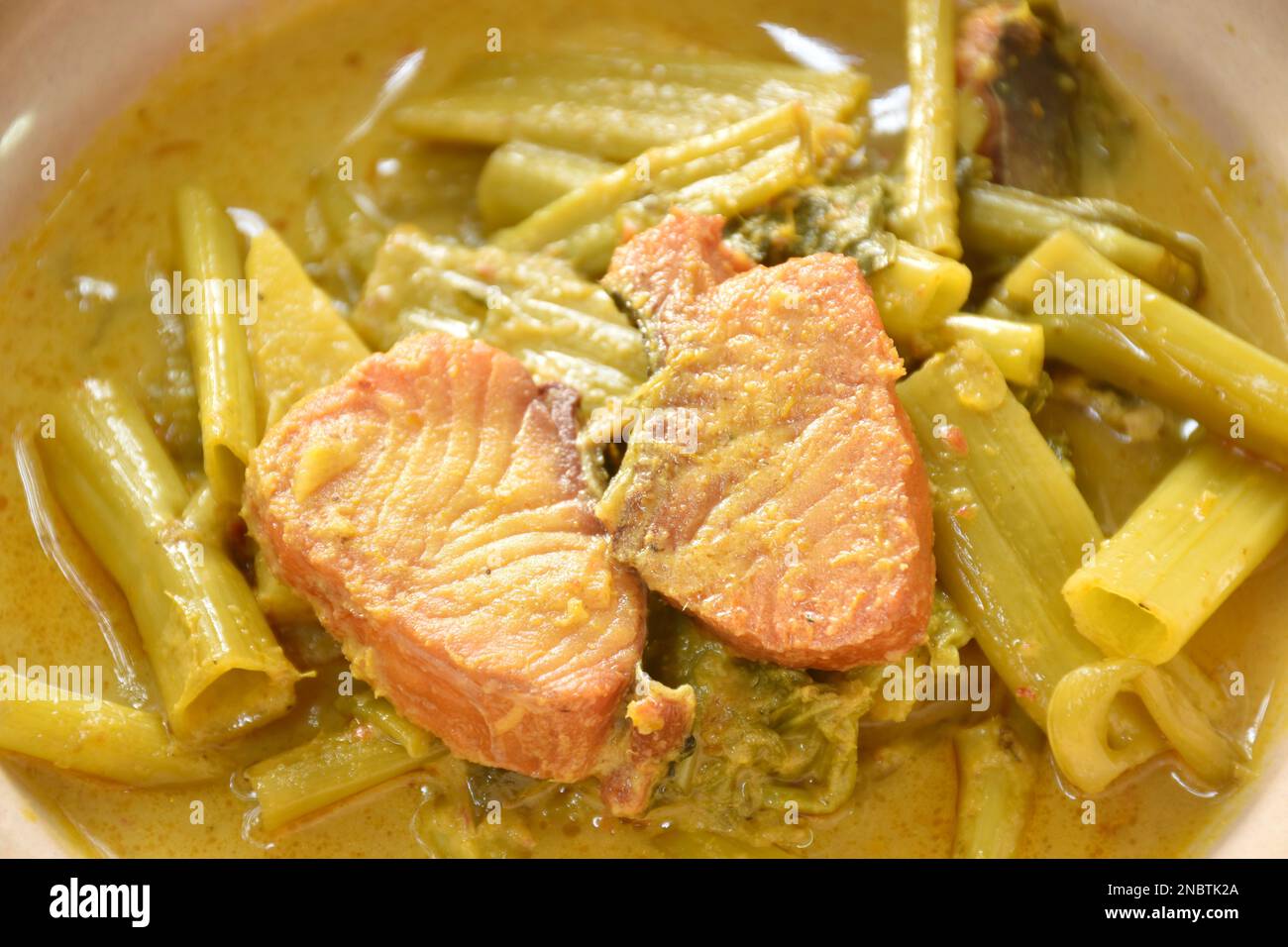 boiled dry salty mackerel fish with morning glory and pineapple in ...