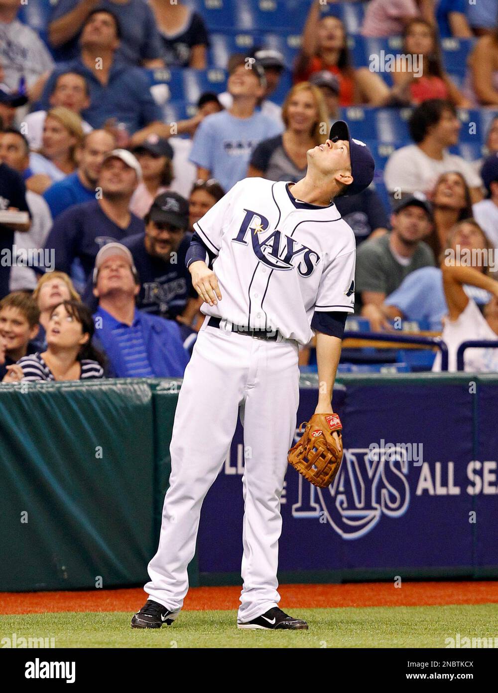 Tampa Bay Rays' Reid Brignac looks up to the roof where a foul ball he ...