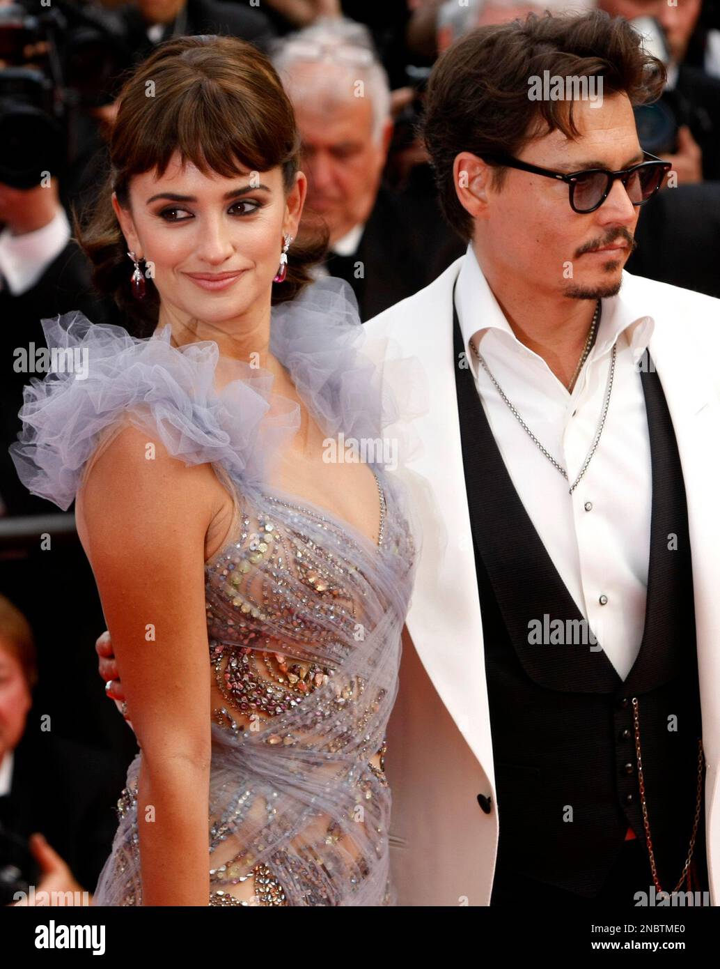 Actors Penelope Cruz, left, and Johnny Depp arrive for the screening of ...