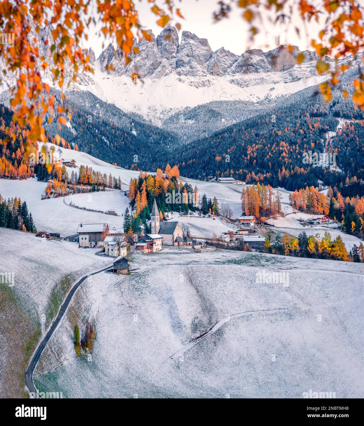 Snowy hills on Santa Magdalena village with Seceda peak on background ...