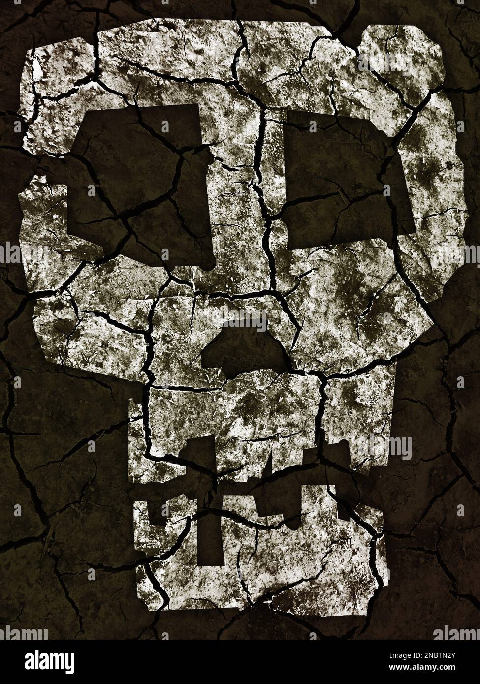 Distressed dry cracked earth with symbol of skull. Photo-montage with ...