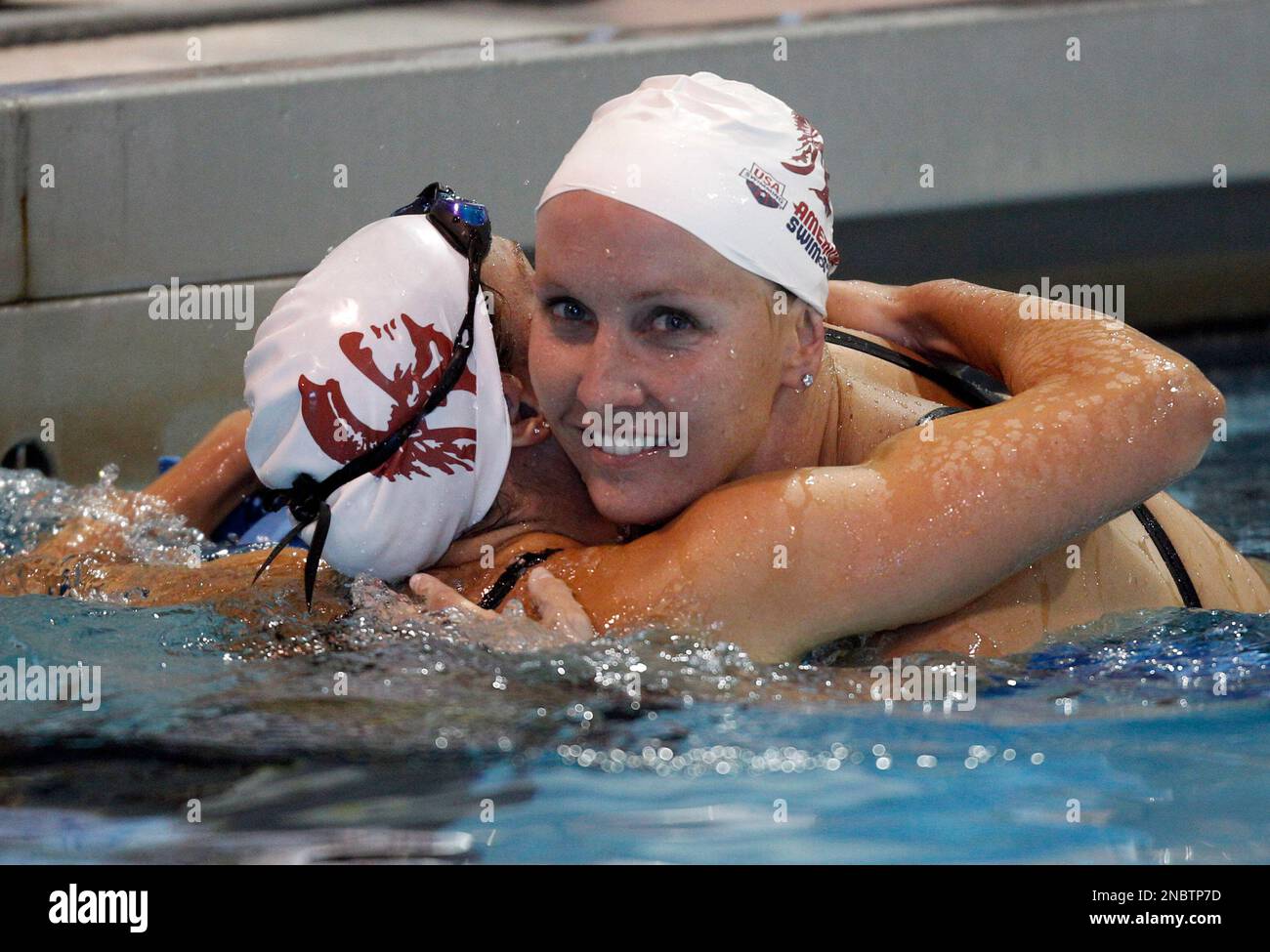 Rebecca Soni, left, embraces Jessica Hardy, right, after Soni's win in ...