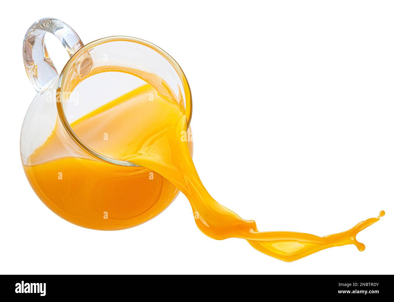 Orange juice pouring from glass pitcher, isolated on white background ...
