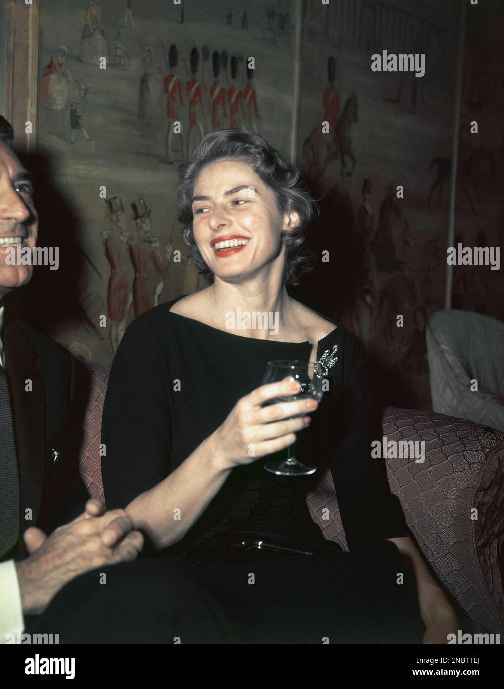 Actress Ingrid Bergman with Cary Grant (mostly not in frame) in 1957 ...