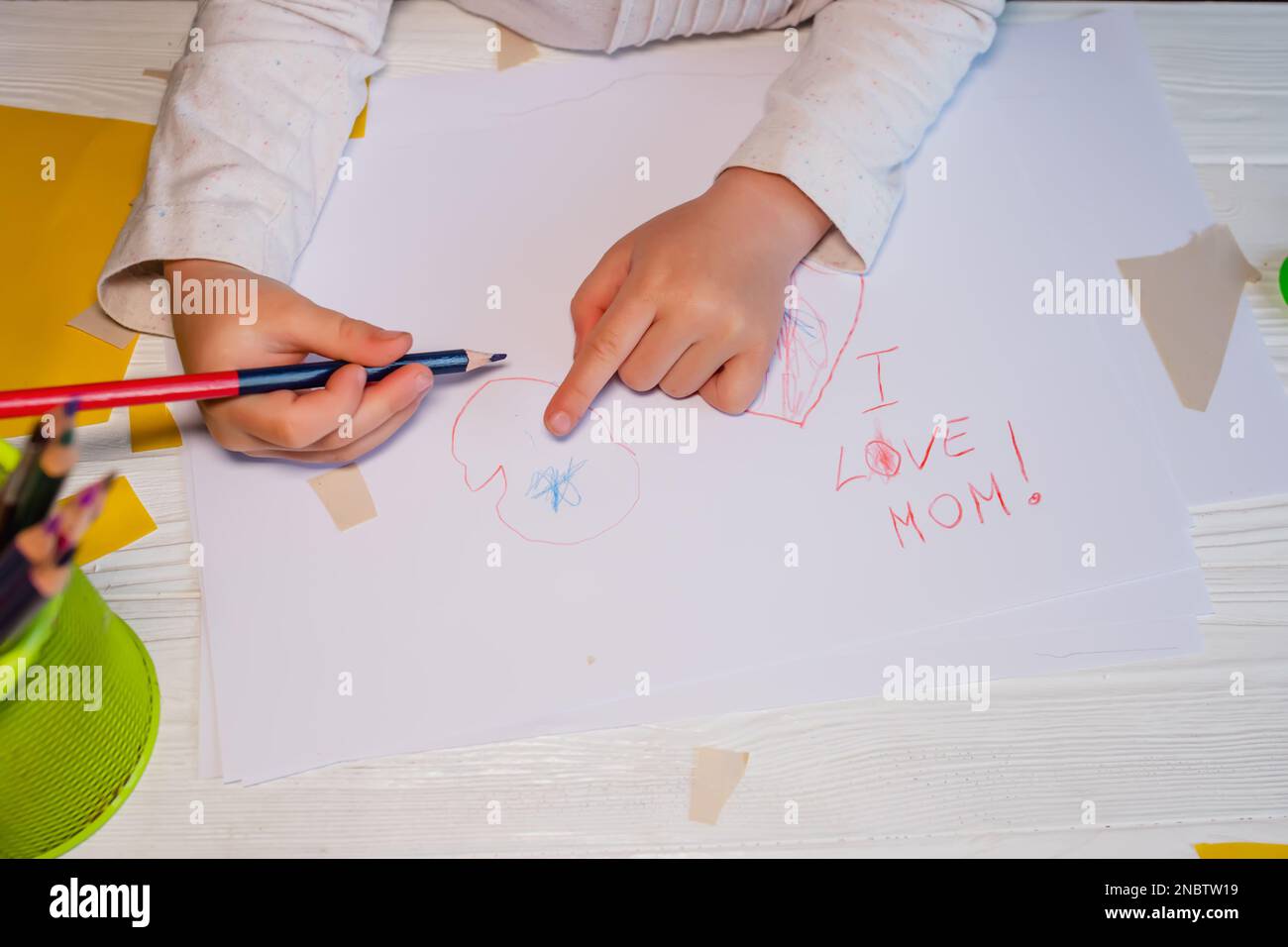 A small child drew congratulations for Mother's Day. Funny children's ...