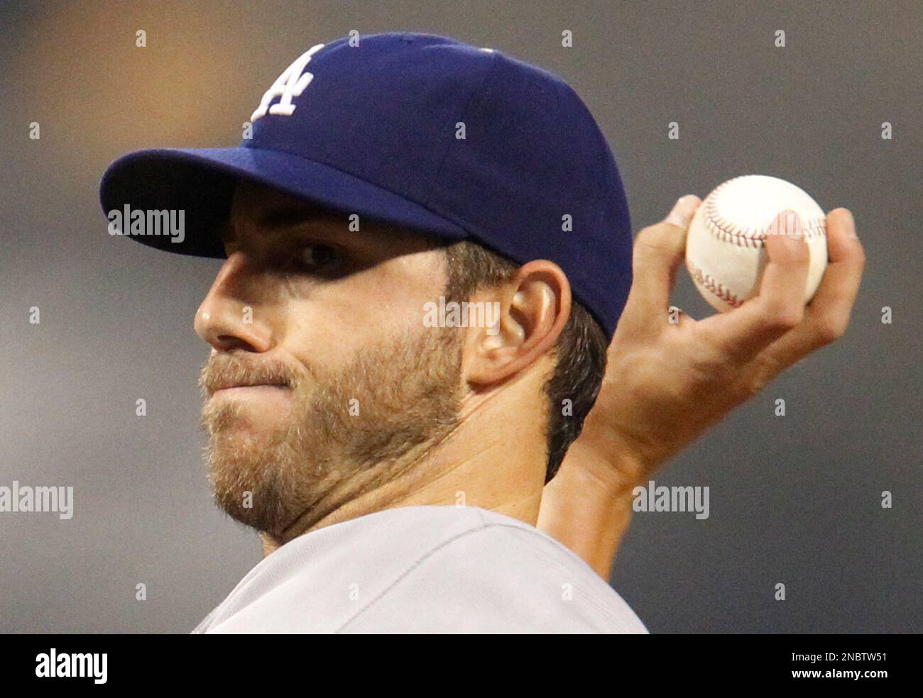Los Angeles Dodgers pitcher Jon Garland throws in the first inning of a ...