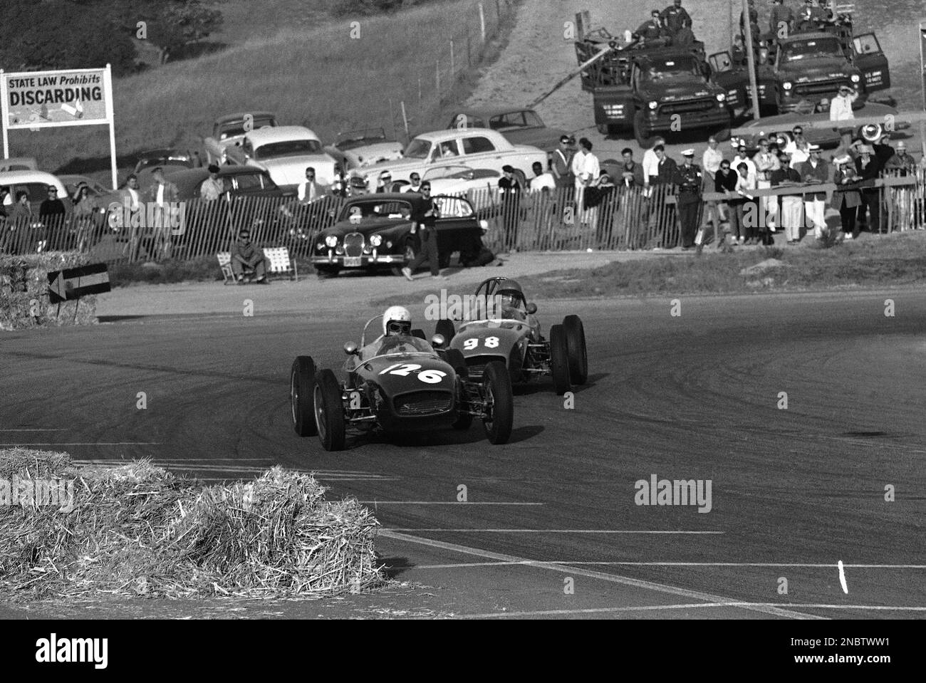 Pat Pigott, Seattle, brings his Lotus Formula Junior through tight turn ...