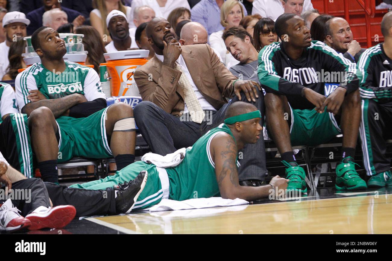 Boston Celtics players including Shaquille O'Neal, center, watch the ...