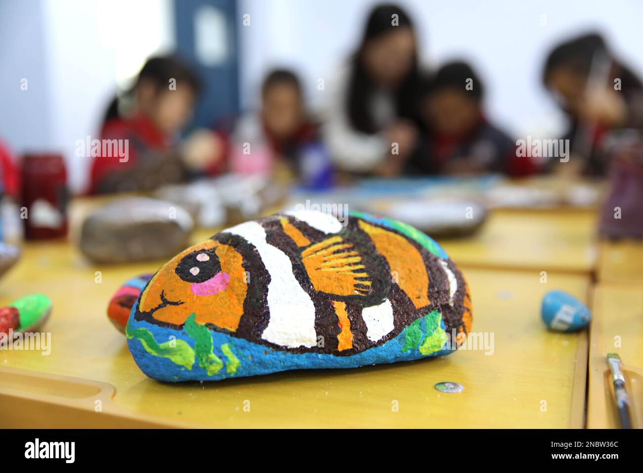 CHENGDE, CHINA - FEBRUARY 14, 2023 - Students make stone paintings ...