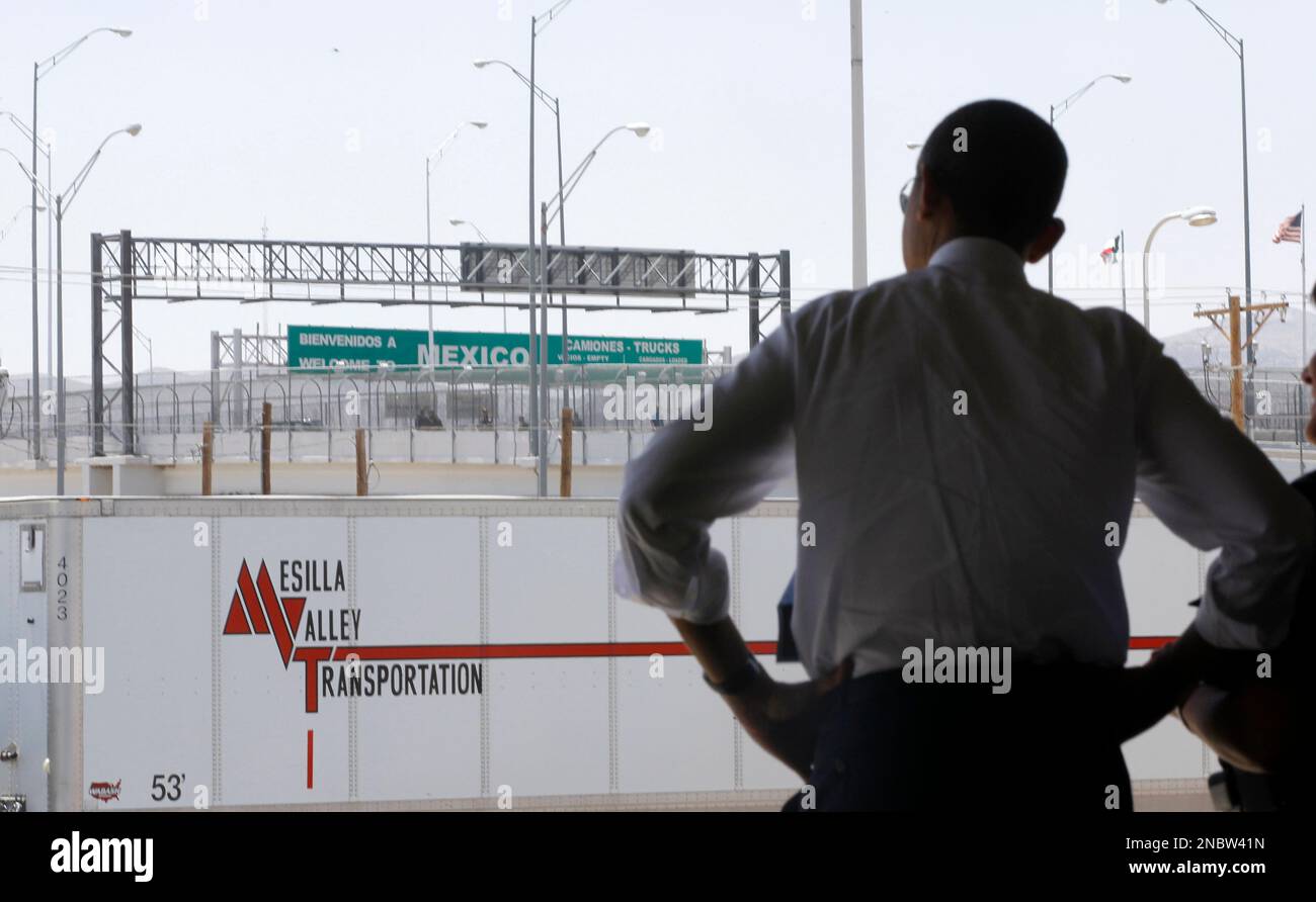 President Barack Obama looks towards Mexico as he tours the Bridge of America Cargo Facility in ...
