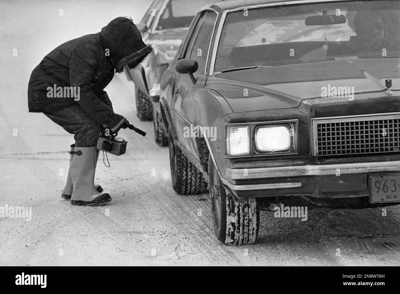 Rochester Gas and Electric employee checks for radiation from cars that ...