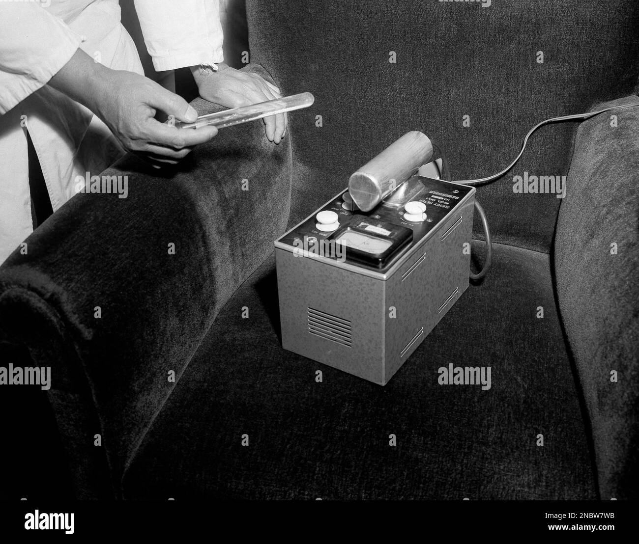 A test tube of the radioactive ashes retrieved from the deck of the ...
