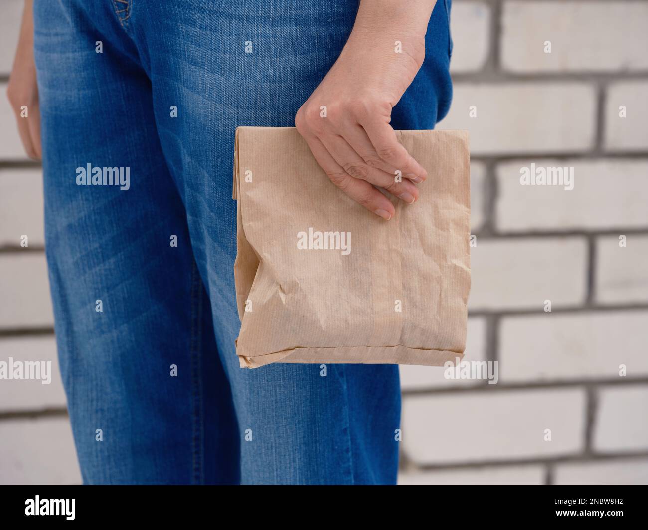 Bag hand hi-res stock photography and images - Alamy