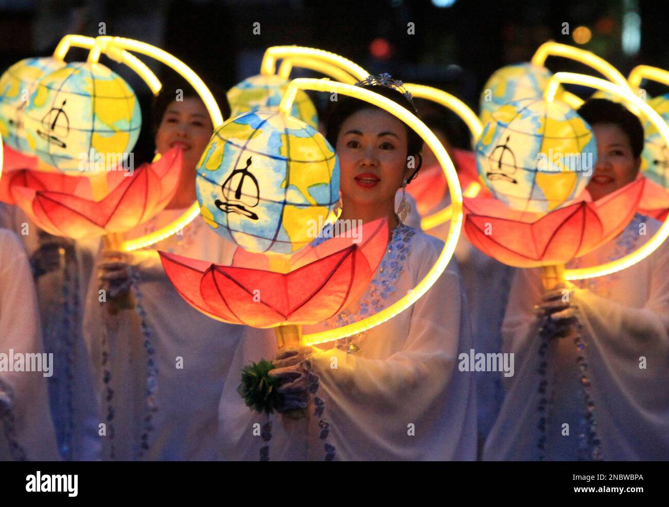 South Korean Buddhists carry lanterns during a lantern festival to ...