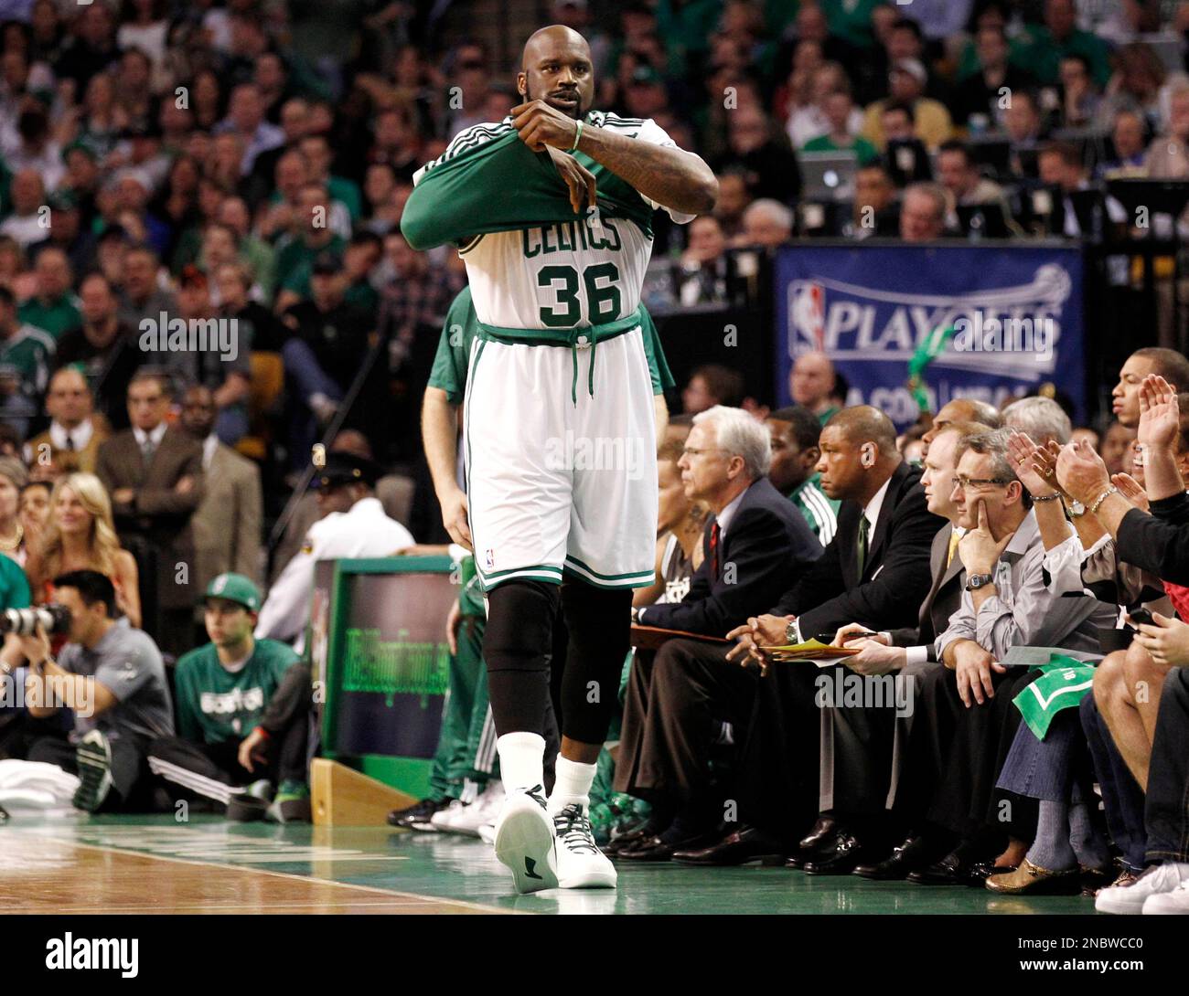 Boston Celtics' Shaquille O'Neal walks to the scorers table to check in ...