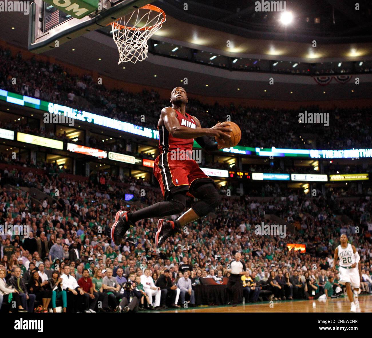 Miami Heat's Dwyane Wade goes in for a dunk during the first quarter of ...