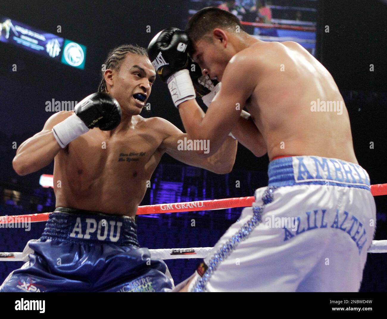 Pier Olivier Cote, left, of Canada, throws a combination of punches at ...