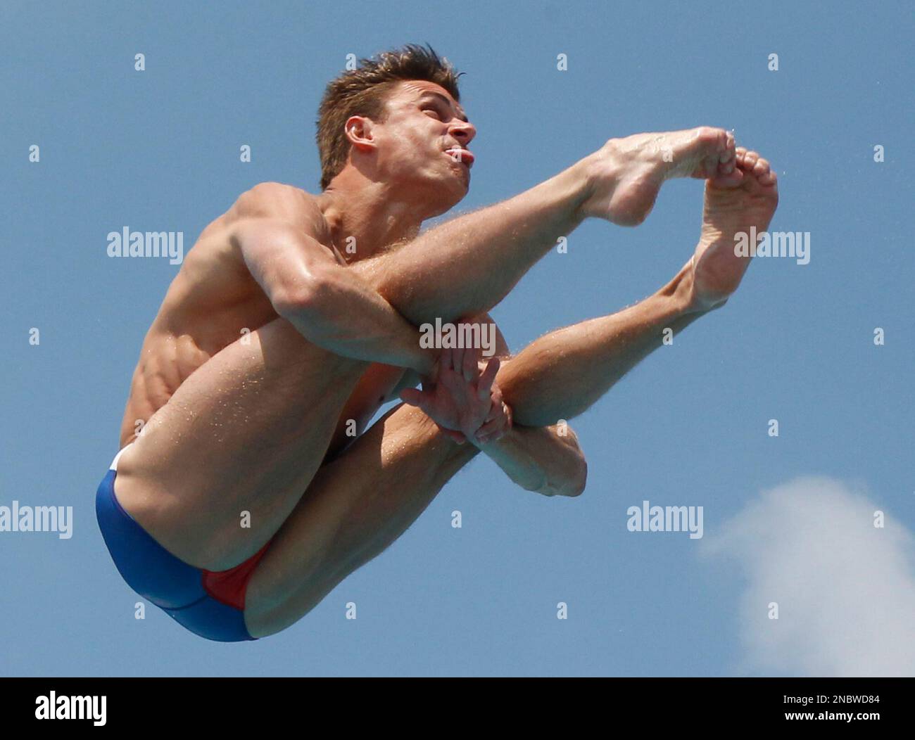 Troy Dumais competes during the men's three-meter springboard final at ...