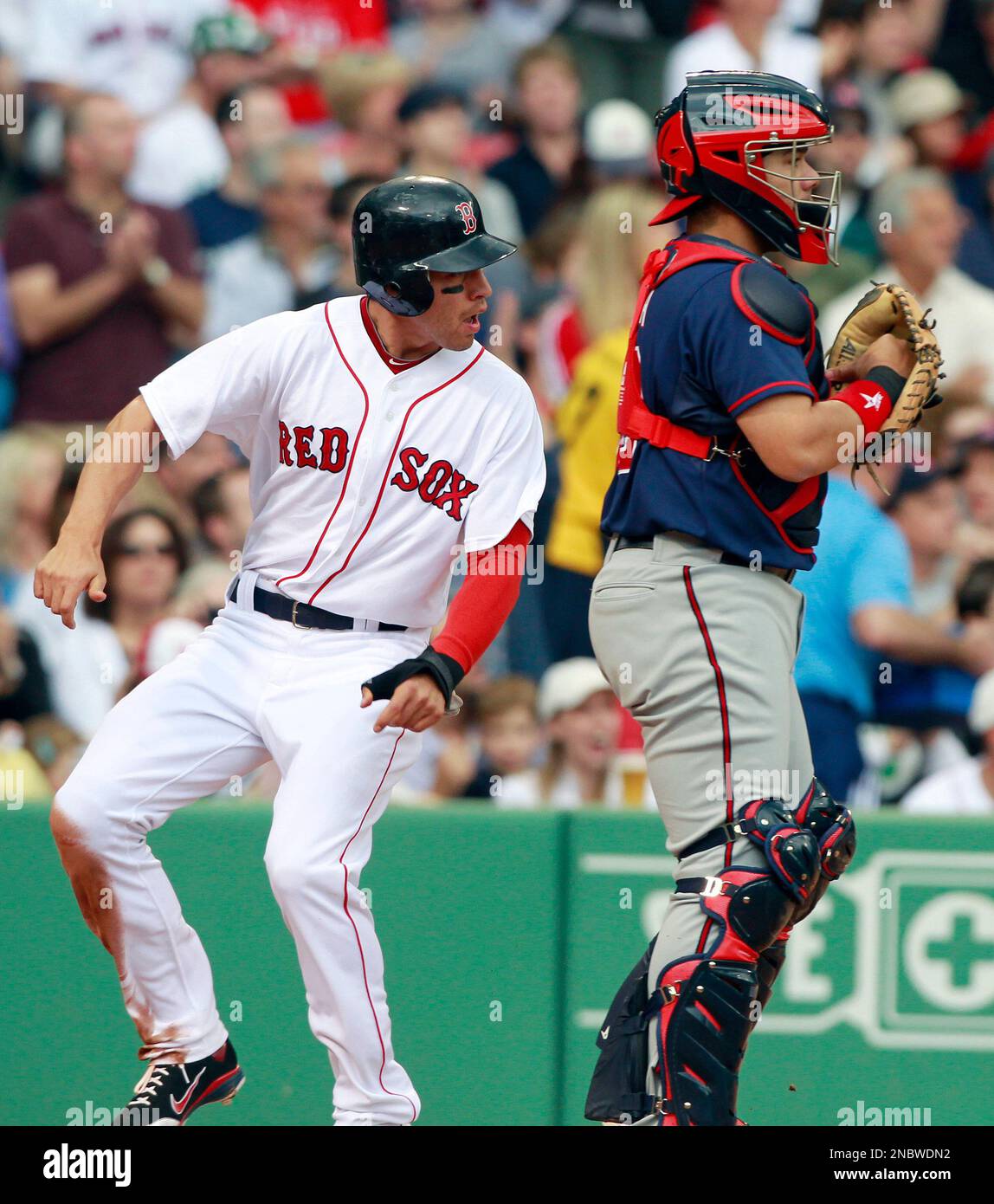 Boston Red Sox's Jacoby Ellsbury, left, looks to the field behind ...