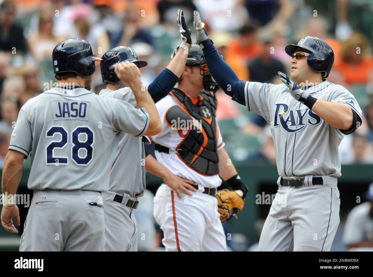 Tampa Bay Rays' Evan Longoria, right, is congratulated by Ben Zobrist ...