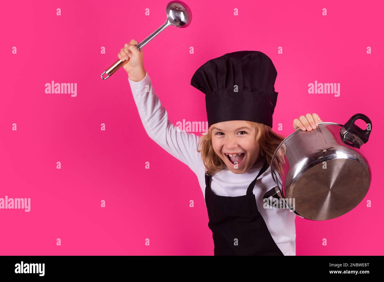 Fynny kid chef cook with cooking pot and ladle. Child chef cook. Child ...