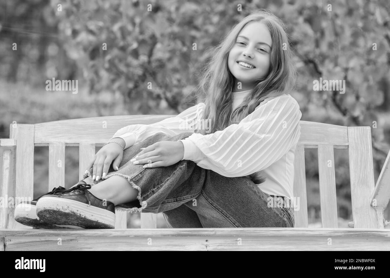 teen girl having fun on playground. childhood happiness. relax in park ...