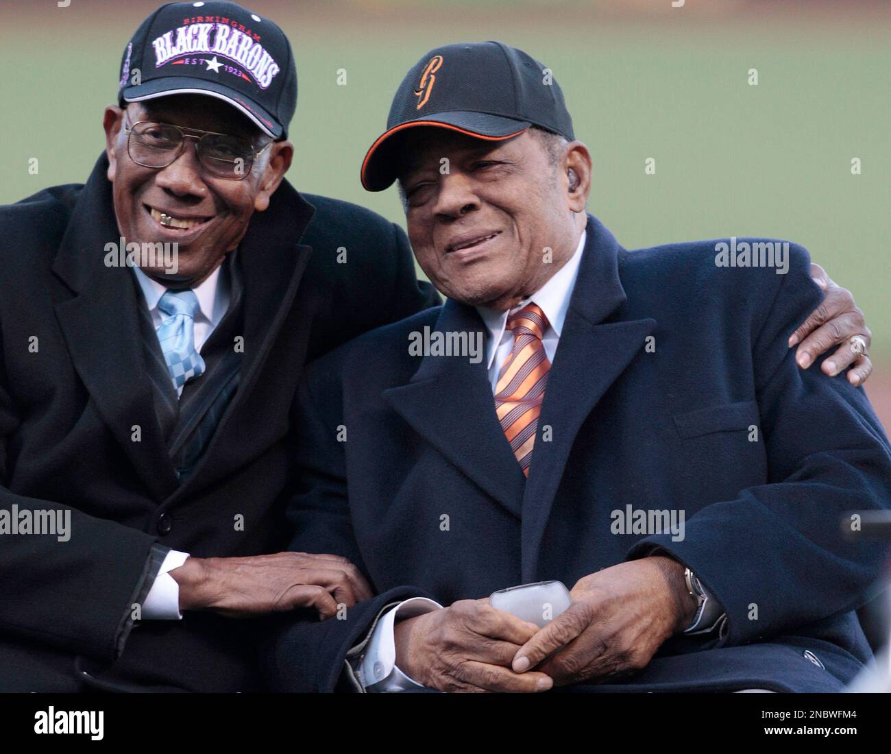 Hall of Famer Willie Mays, right, laughs with former Negro Leagues ...