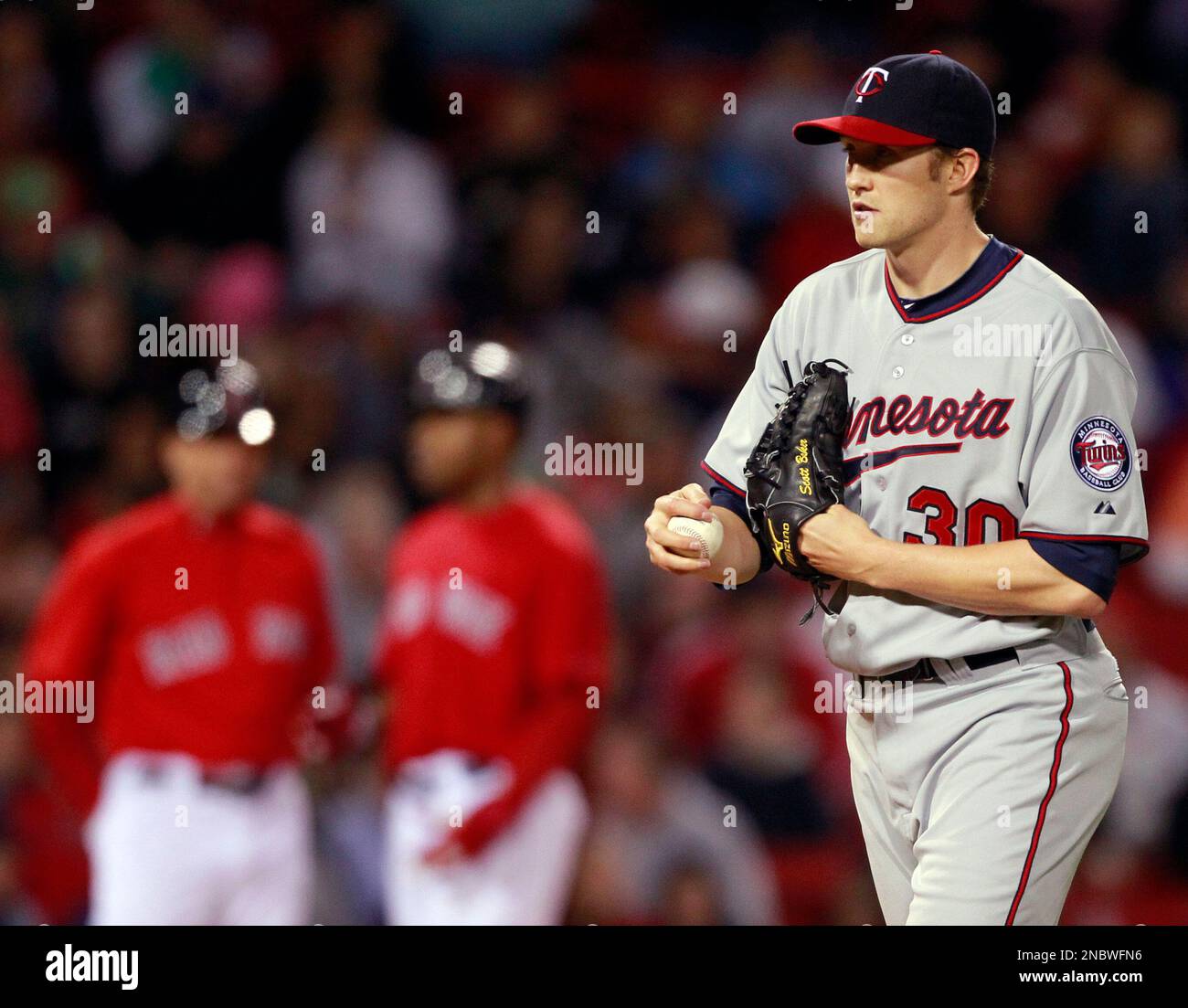 With Boston Red Sox's Carl Crawford on third base, second from left ...