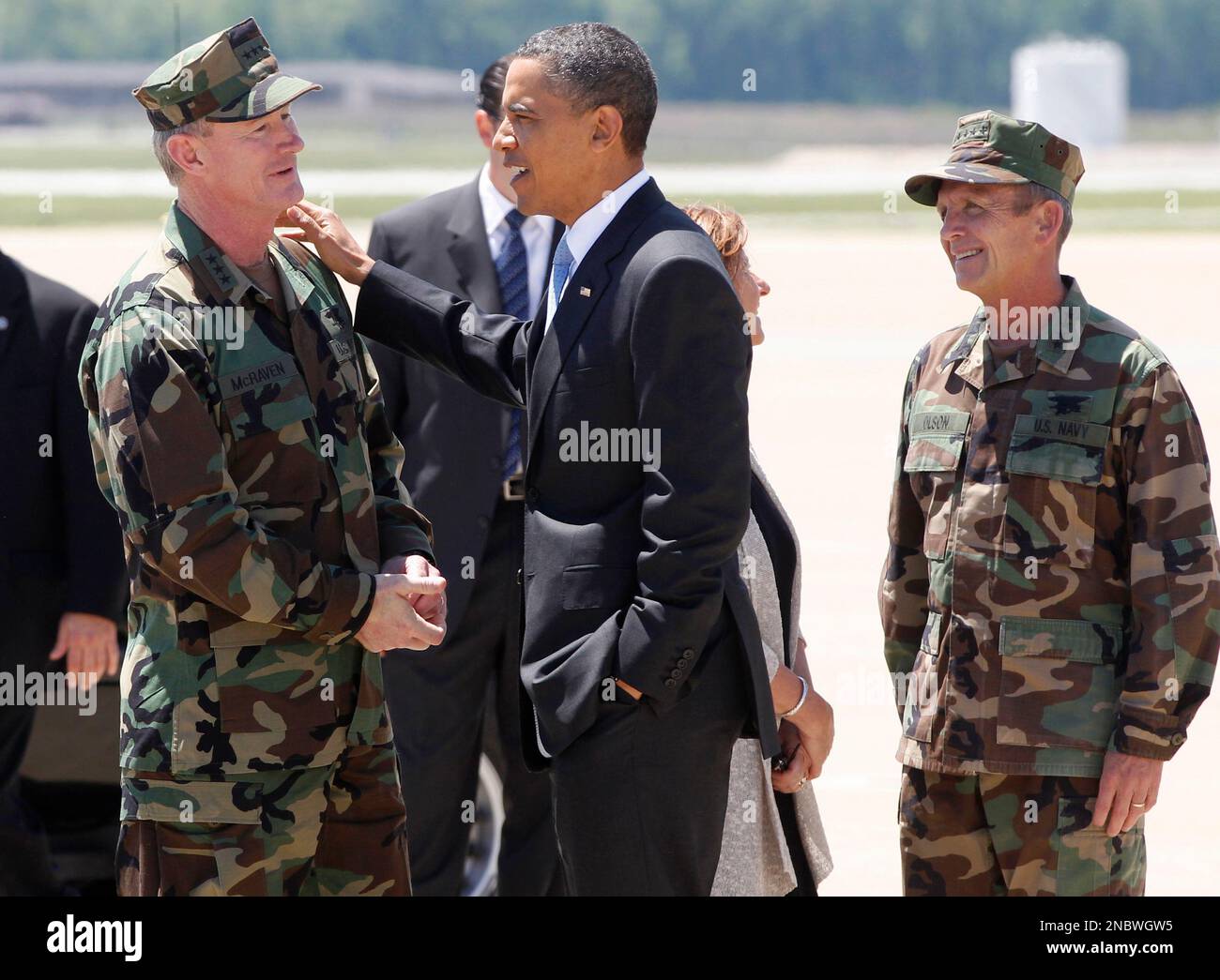 President Barack Obama talks with U.S. Navy Vice Admiral William H ...