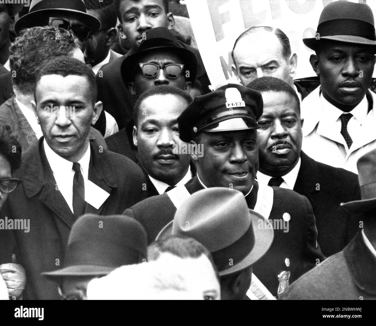 Dr. Martin Luther King Jr., is completely hemmed in as he and his aide ...