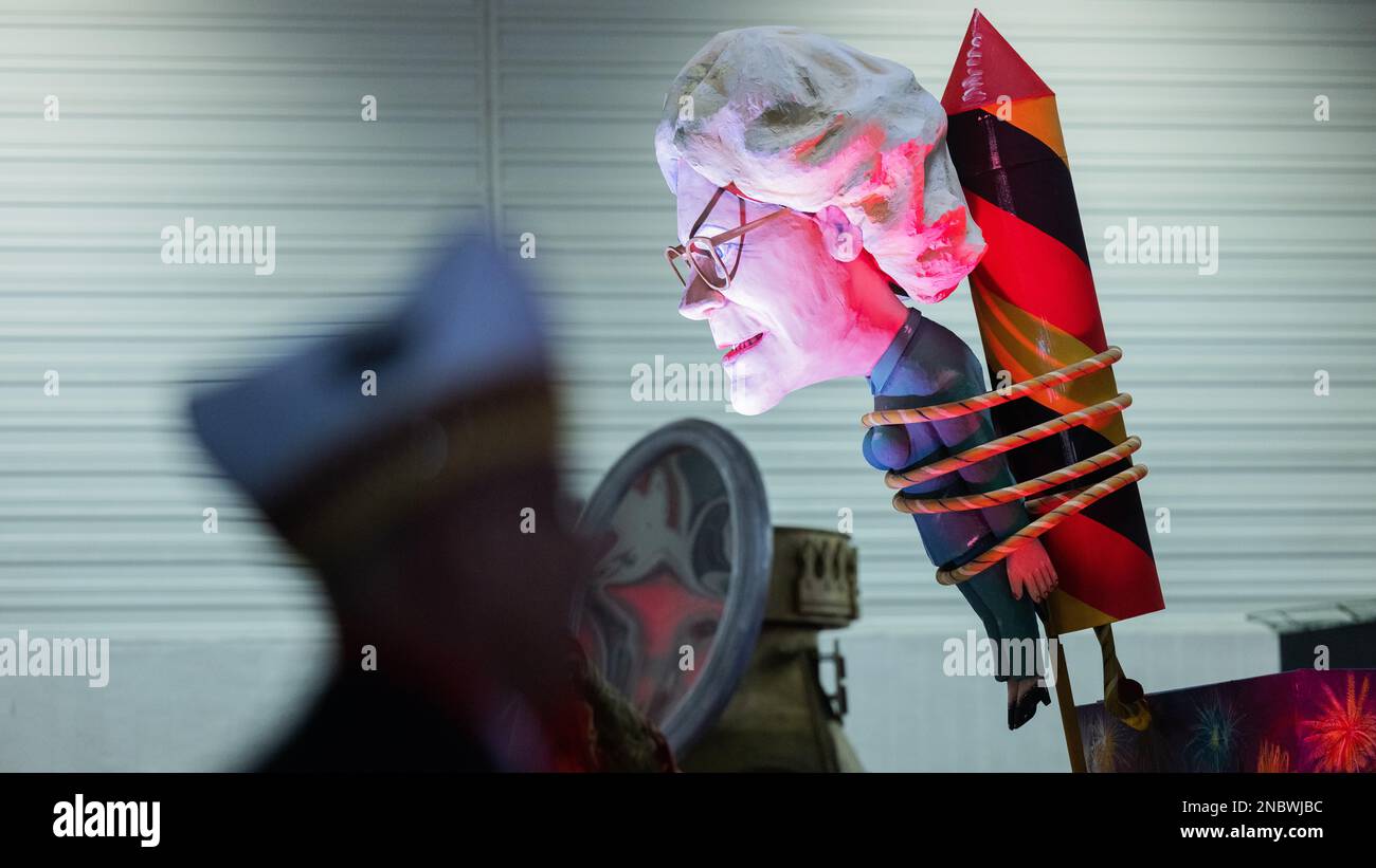 Cologne, Germany. 14th Feb, 2023. A theme float showing former Defense ...
