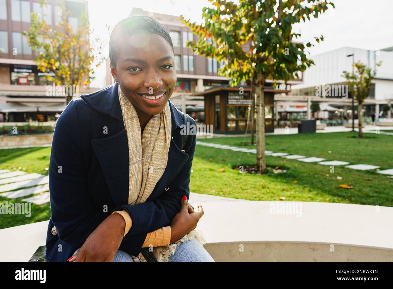 Stylish african female student near university campus Stock Photo - Alamy