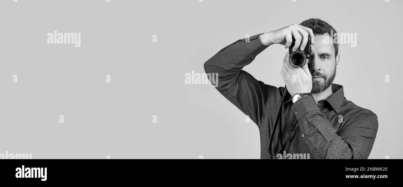 Amateur photographer shoot picture with handheld photo camera grey ...