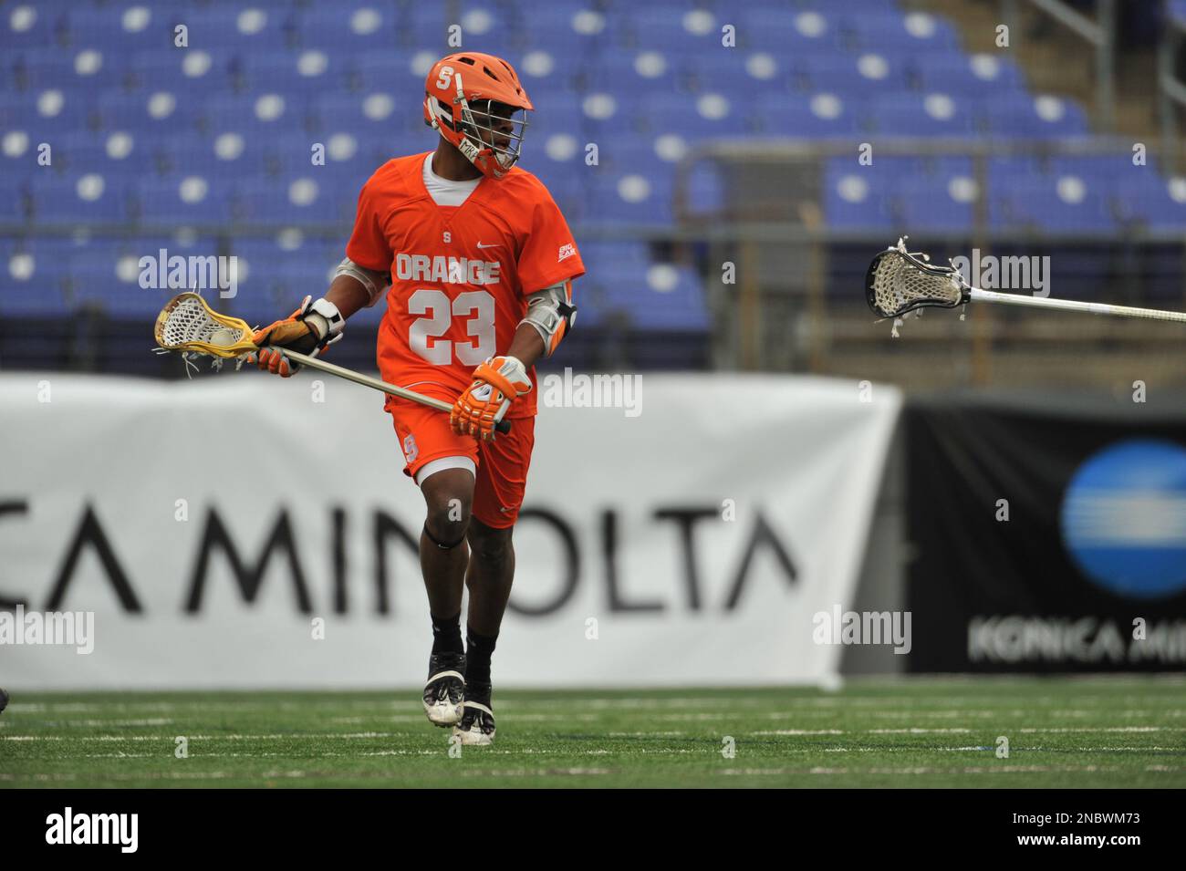 Syracuse's midfielder Jovan Miller (23) works the ball against ...