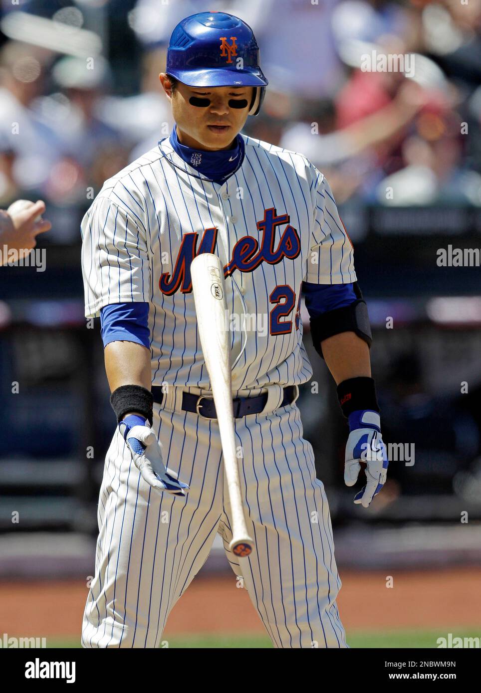 New York Mets batter Chin-lung Hu, of Taiwan, tosses his bat after ...