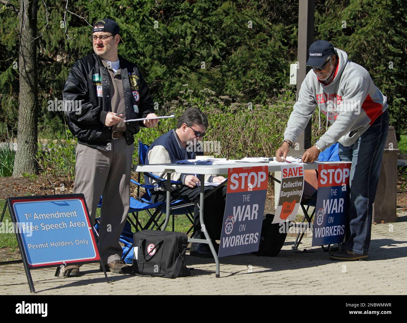 Teamsters Matt Ford, left, Eric McKee, center, and Charles Smith ...