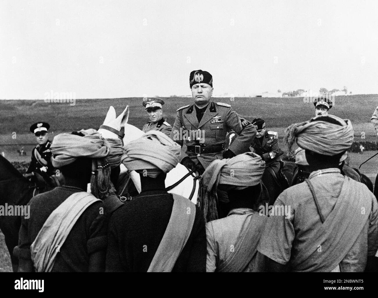 Signor Benito Mussolini addressing some dubats during his visit to the ...
