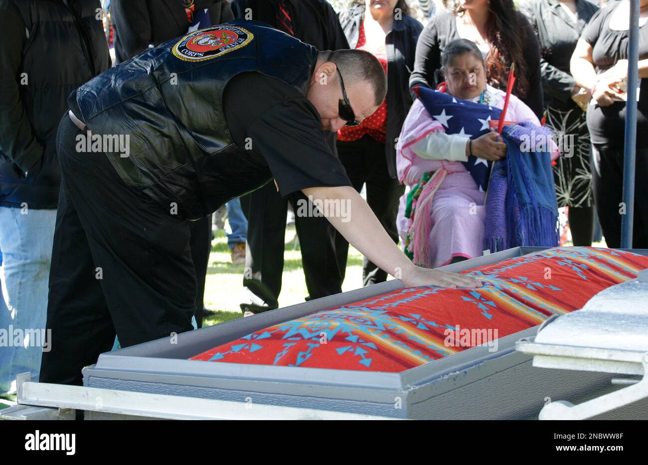 Shawn Marceau, left, the foster father of Marine Lance Cpl. Joe Jackson ...