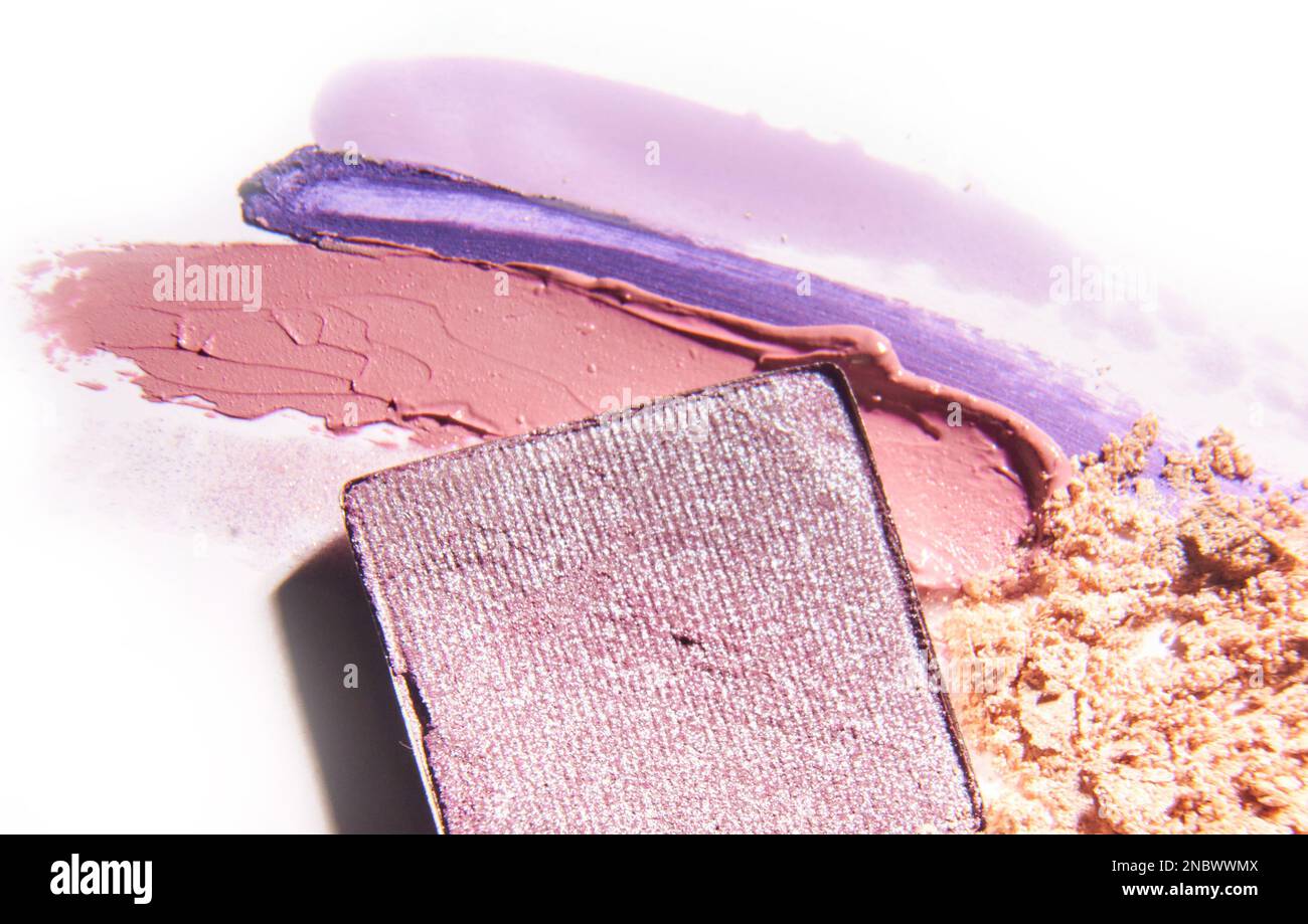 Make-up swatches-purple eye shadow, skin-colored powder, pink lipstick ...