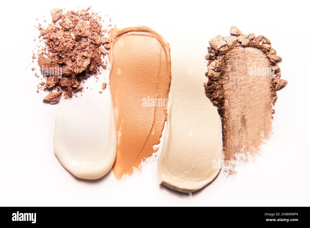 Make up swatches-brown powder, beige, skin-colored, and light beige ...