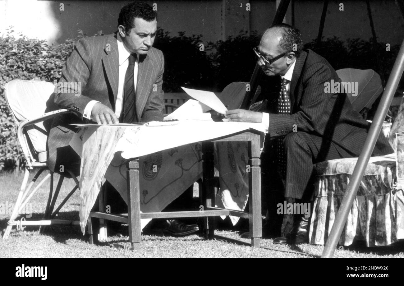 In this undated photo taken in 1975, Vice President Hosni Mubarak, left ...