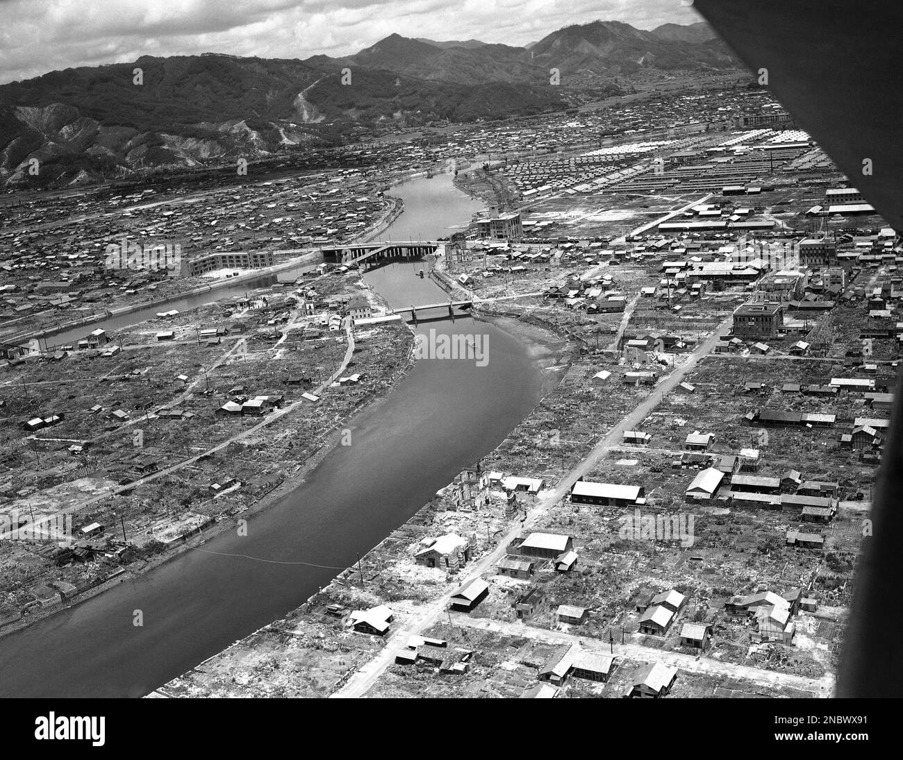 This air view looks toward the center of Hiroshima, Japan and the “T ...