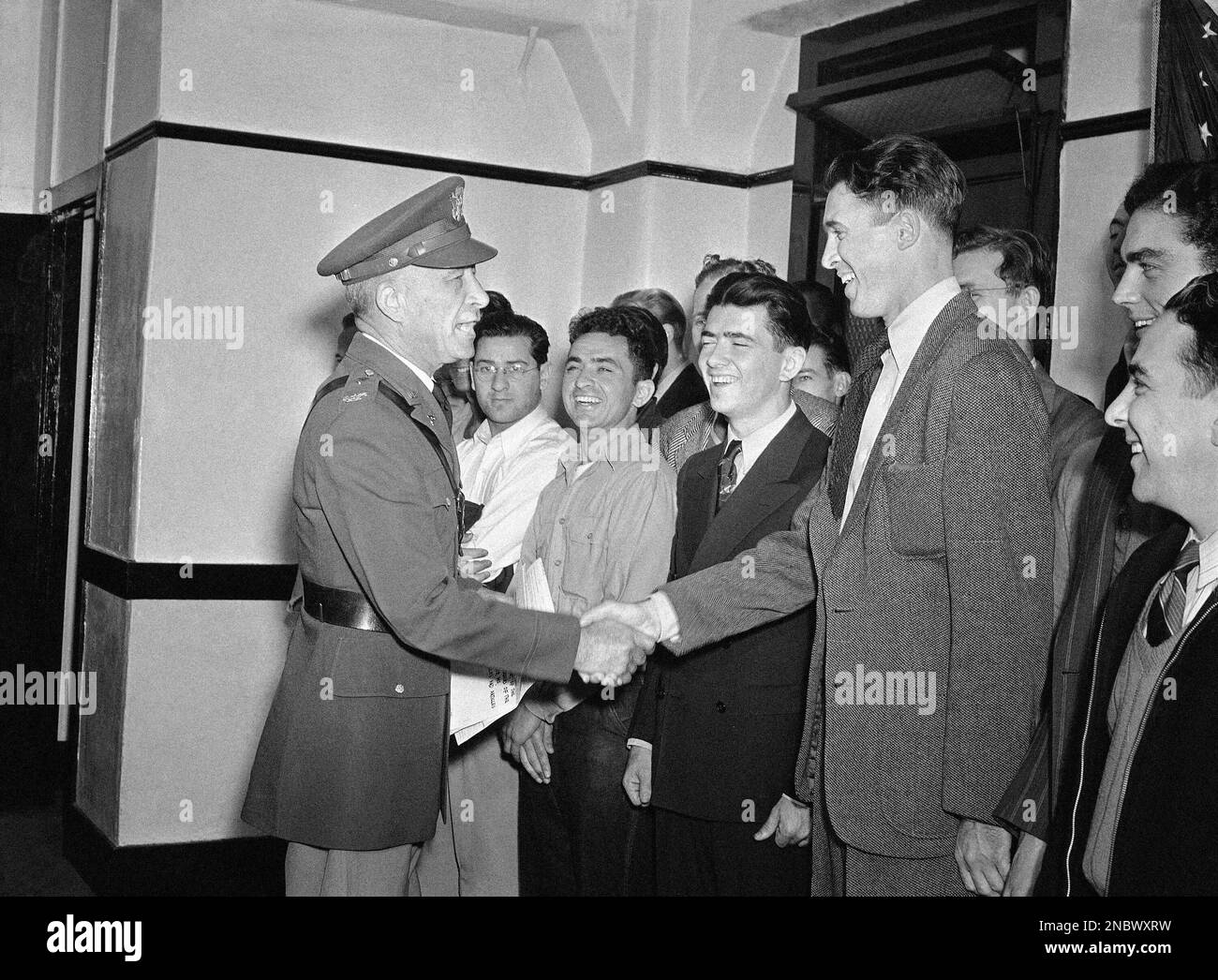 Hollywood actor Jimmy Stewart receives congratulations from Col. John A ...