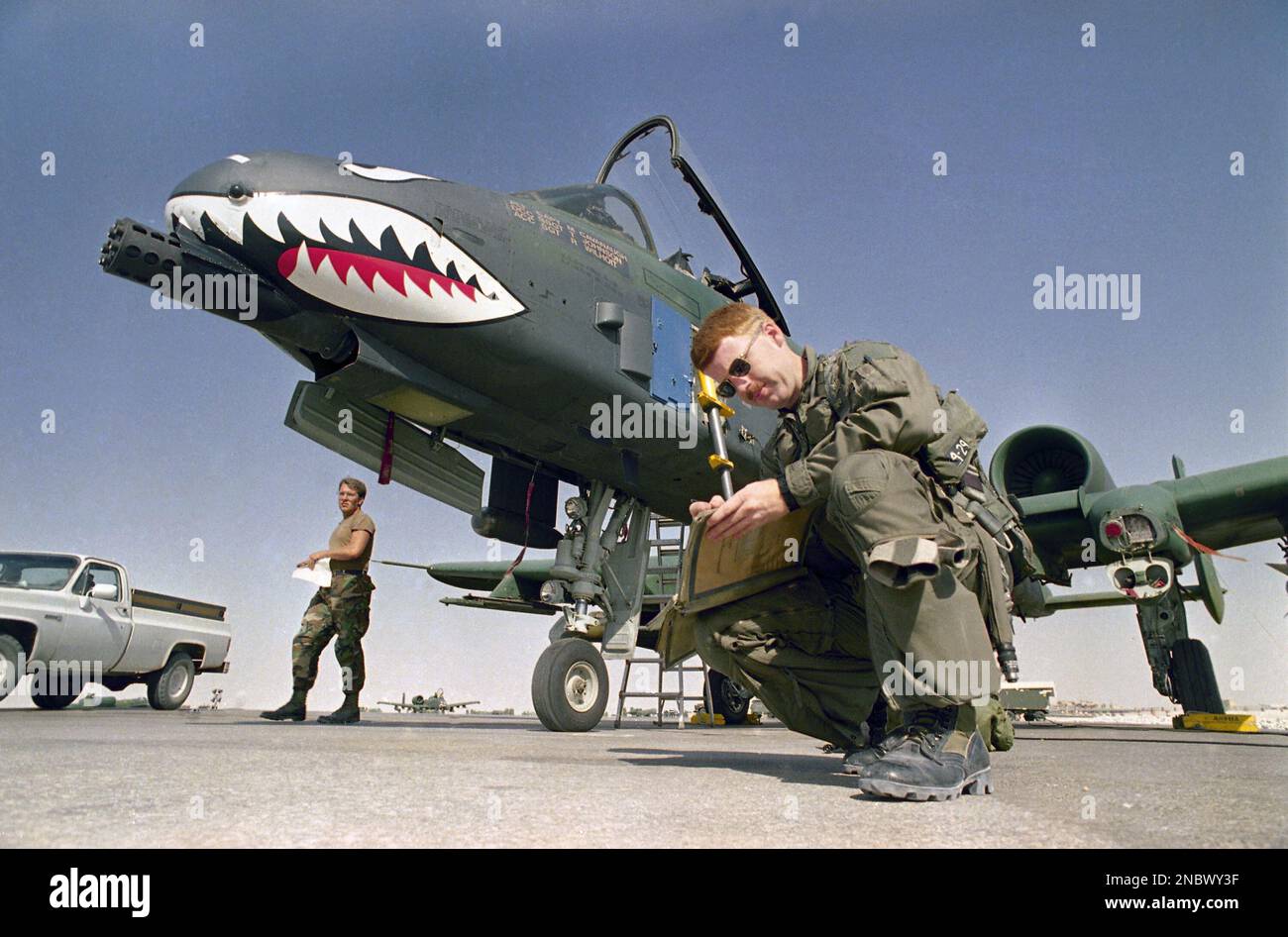 Air Force pilot 1st Lt. Ralph Hansen of Gresham, Ore., fills out his ...