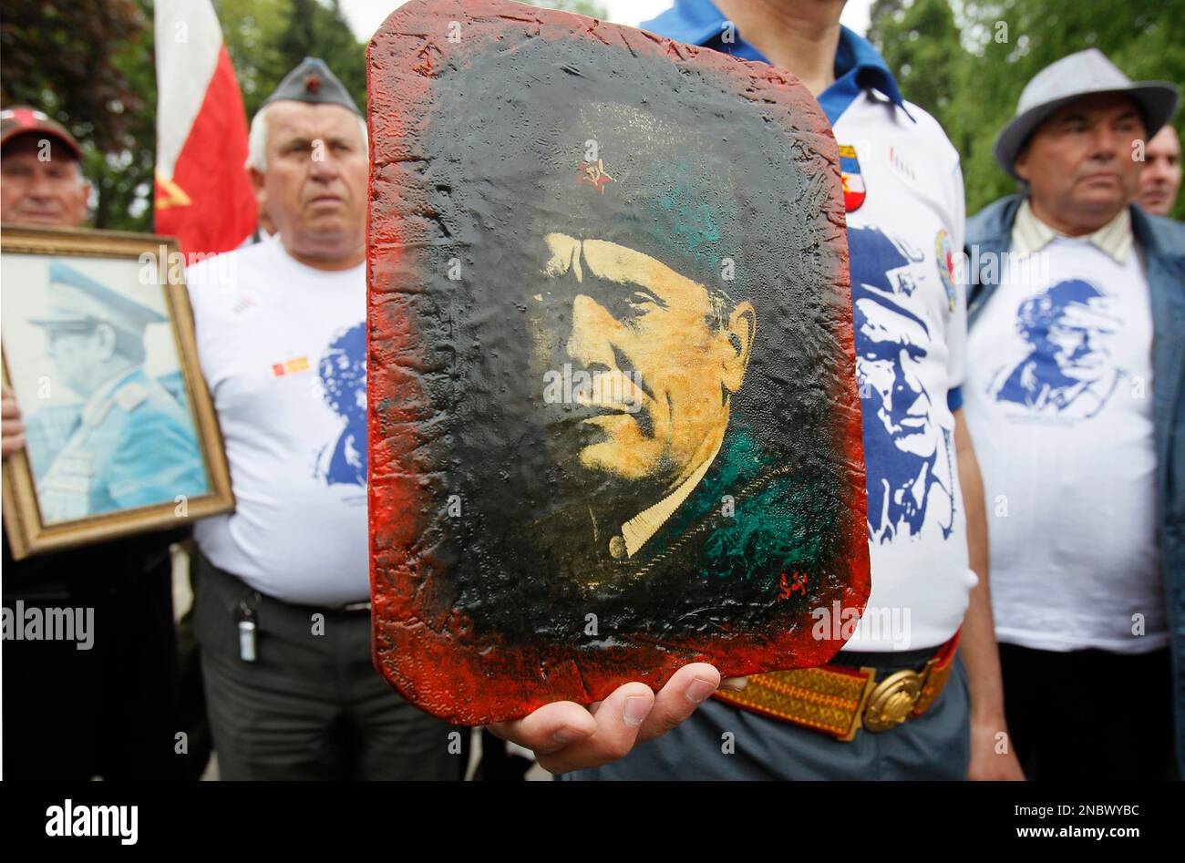 People carrying photos of the late Yugoslav communist president Josip ...